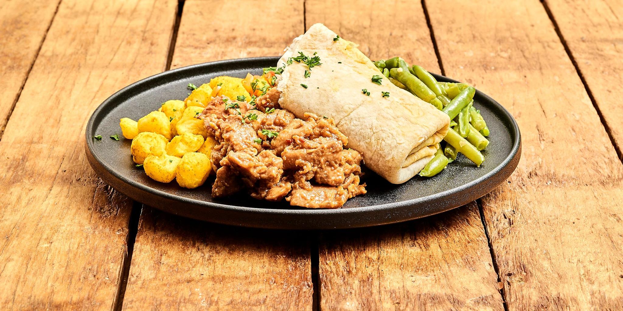 Surinaamse roti met curry van kip en aardappelen | Uitgekookt